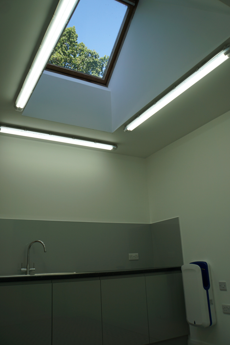 Inside the workshop. The skylight. Workshop, sink, and hand dryer.